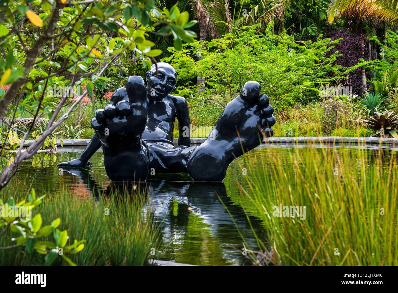 The symbolic statue of an African, Big Foot, in a pond at the Miami ...