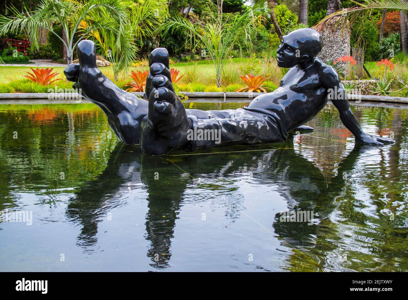 The symbolic statue of an African, Big Foot, in a pond at the Miami ...