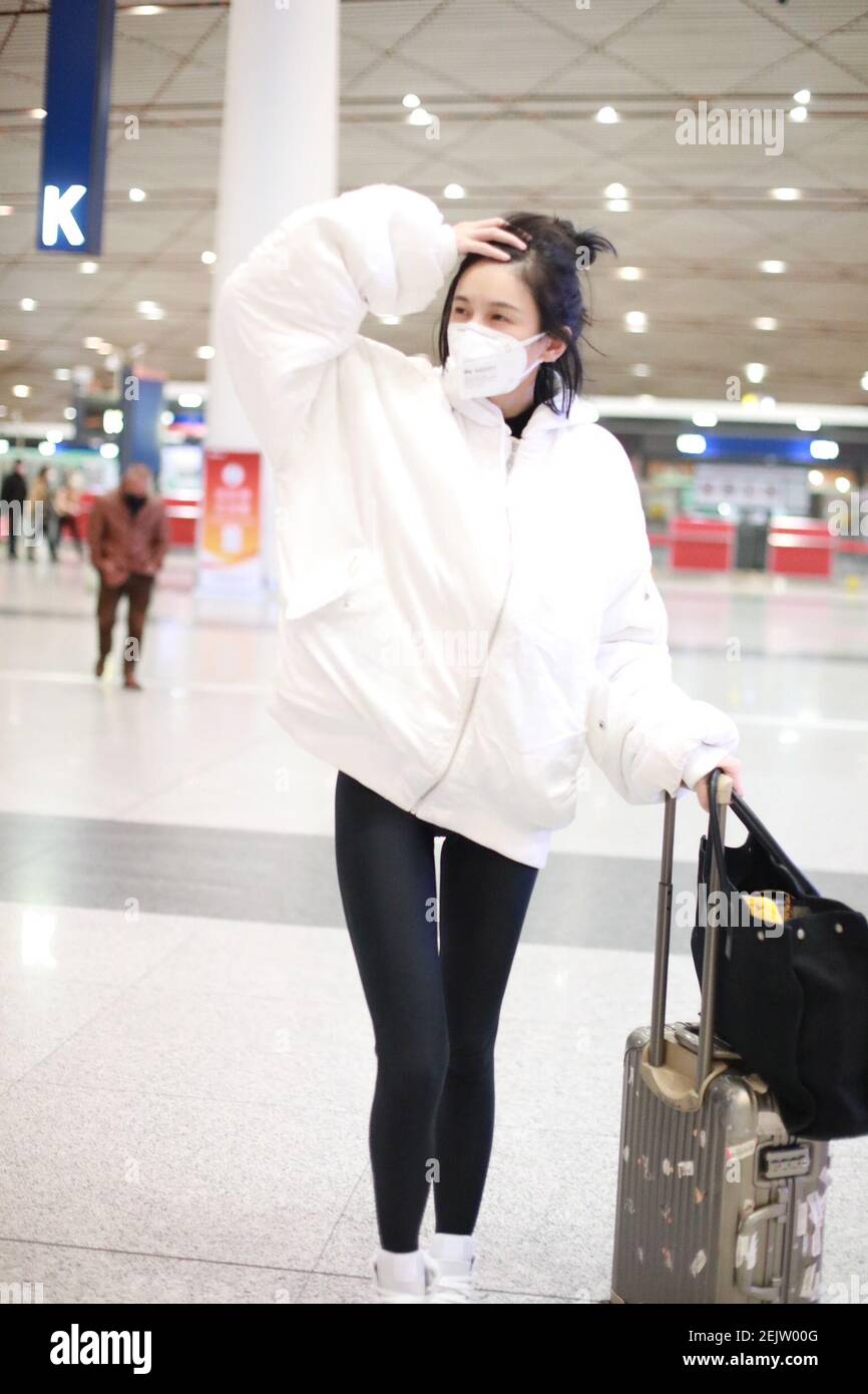 Chinese actress Zhang Lanxin arrives at a Beijing airport before departure in Beijing, China, 10 ...