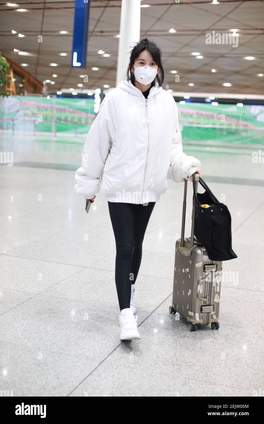 Chinese actress Zhang Lanxin arrives at a Beijing airport before departure in Beijing, China, 10 ...