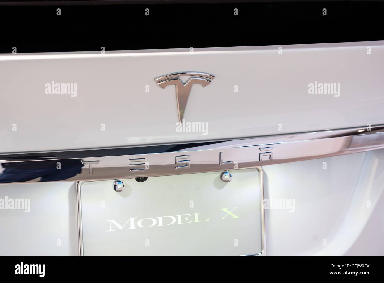 American electric vehicle and clean energy company Tesla logo seen on a ...