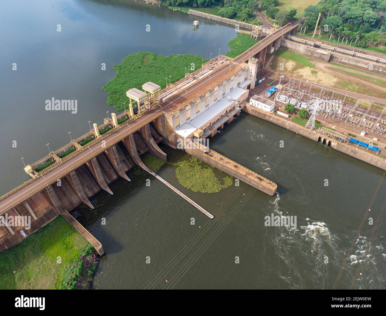 Aerial view of Dam at reservoir with flowing water, hydroelectricity ...