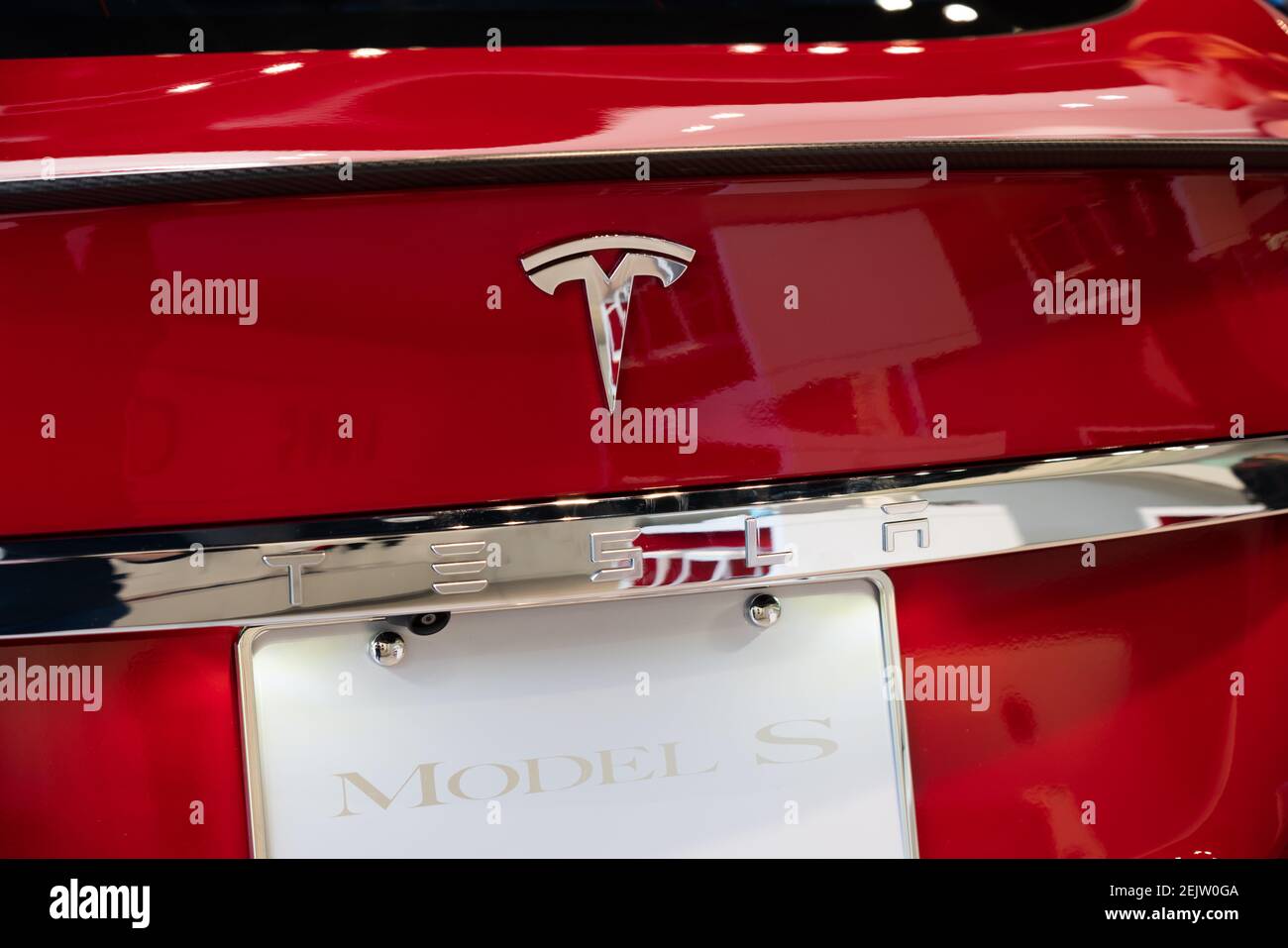 American electric vehicle and clean energy company Tesla logo seen on a ...