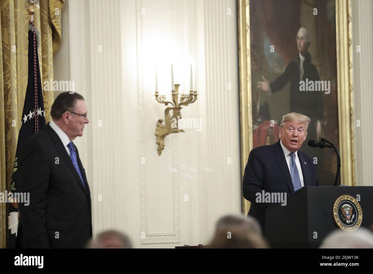 President Donald Trump presents the Presidential Medal of Freedom to ...