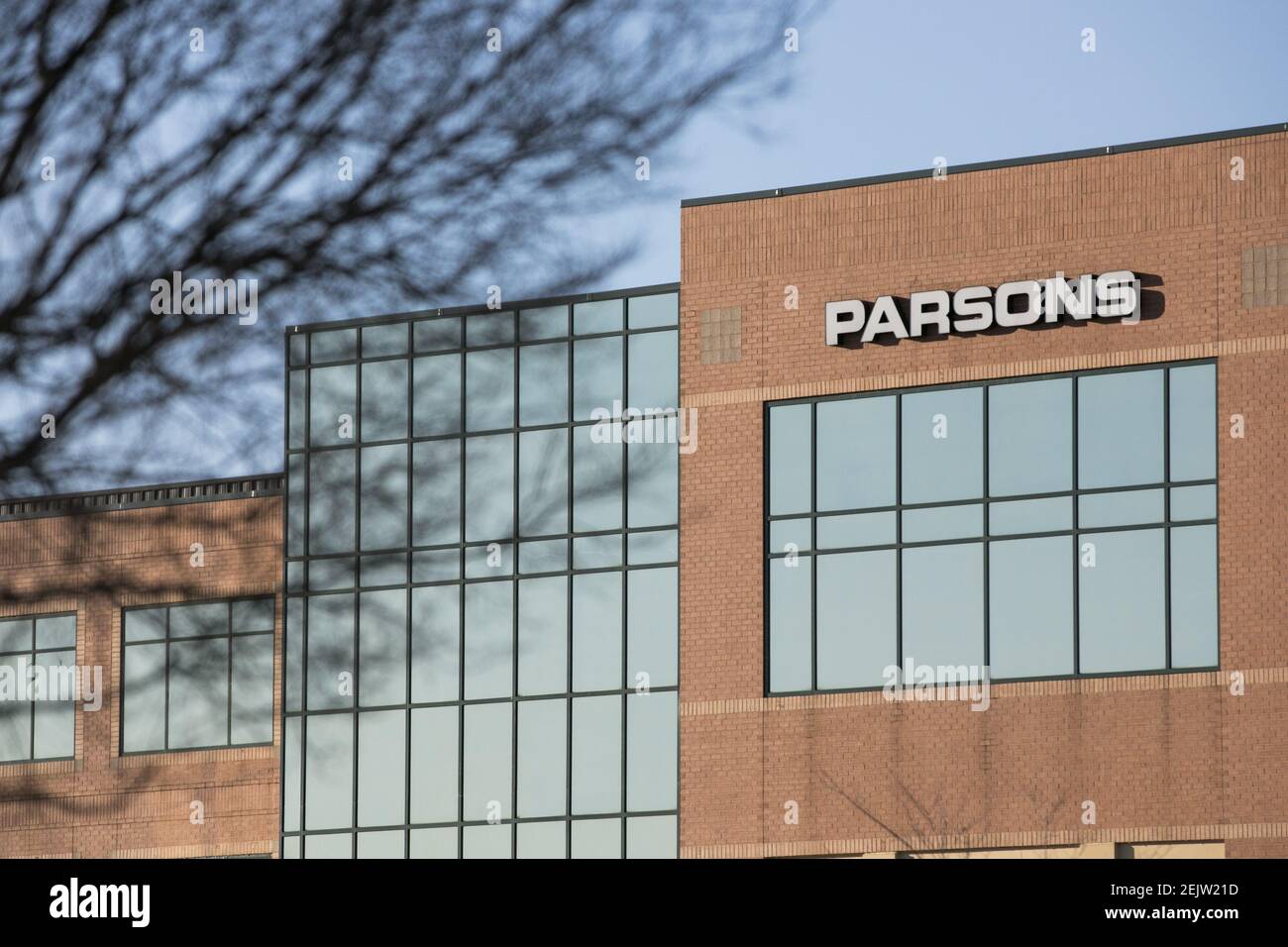 A logo sign outside of a facility occupied by Parsons Corporation in ...
