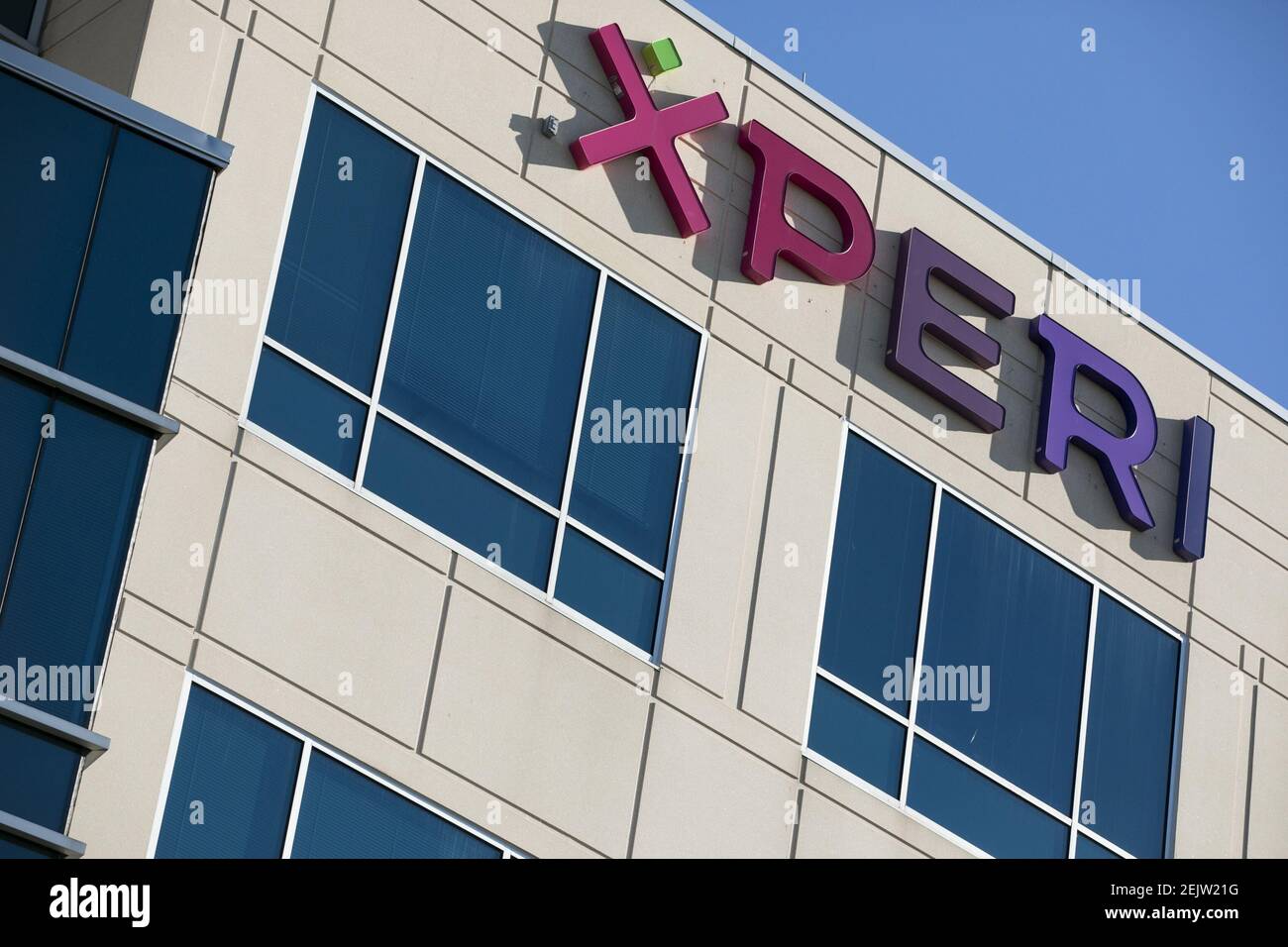 A logo sign outside of a facility occupied by Xperi Corporation in ...