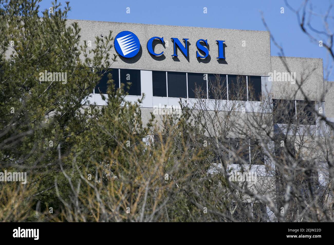 A logo sign outside of the headquarters of CNSI in Rockville, Maryland ...