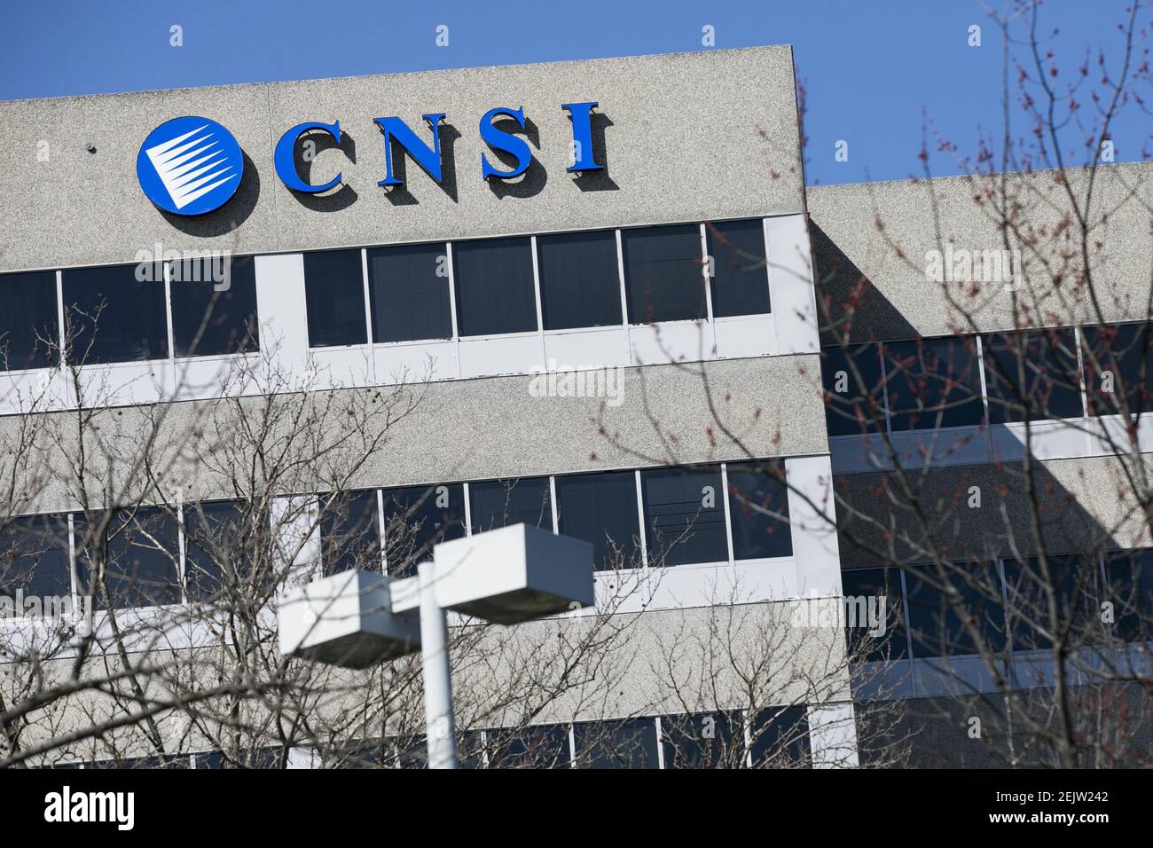 A logo sign outside of the headquarters of CNSI in Rockville, Maryland ...