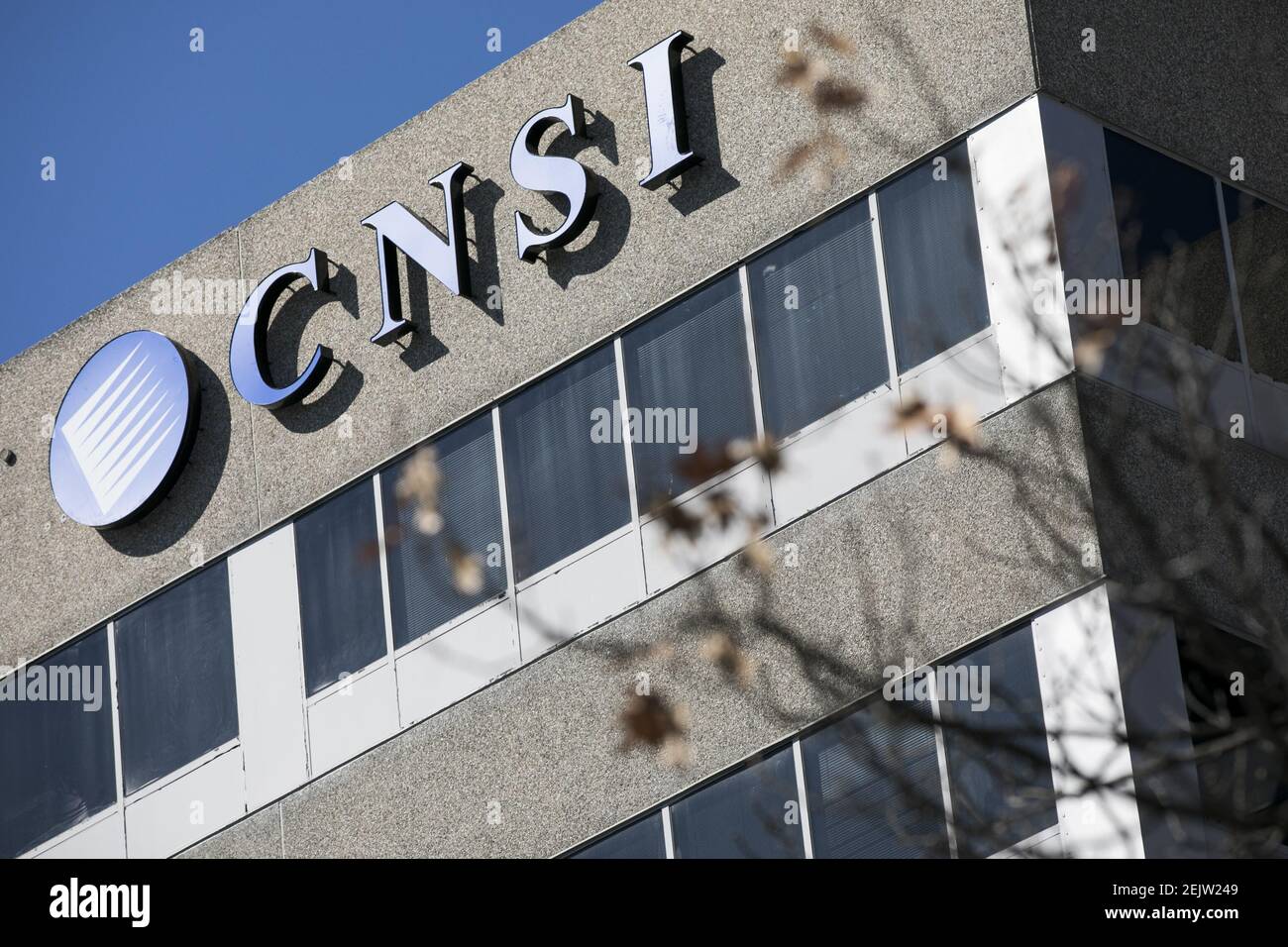 A logo sign outside of the headquarters of CNSI in Rockville, Maryland ...