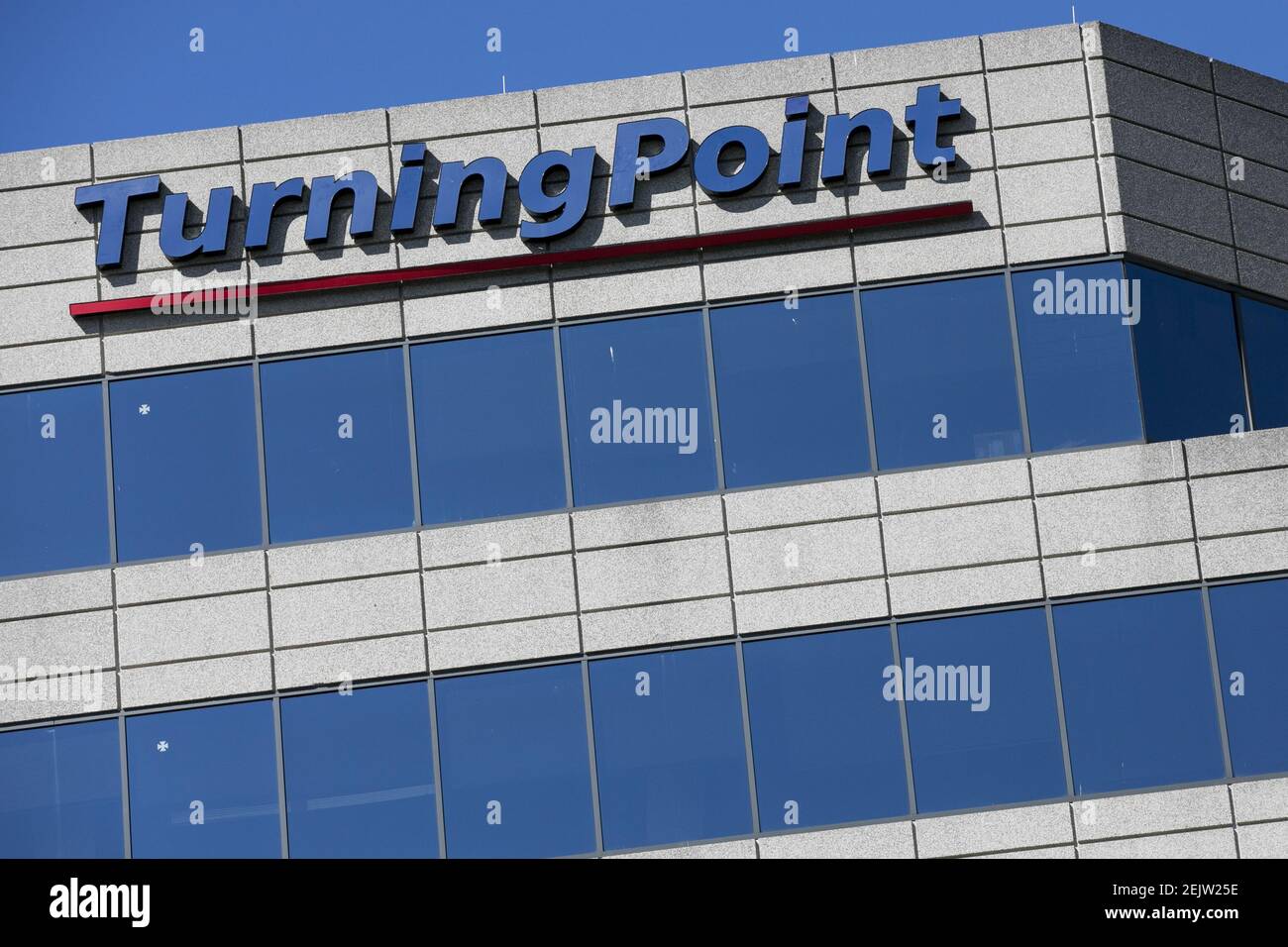 A logo sign outside of the headquarters of TurningPoint Global ...