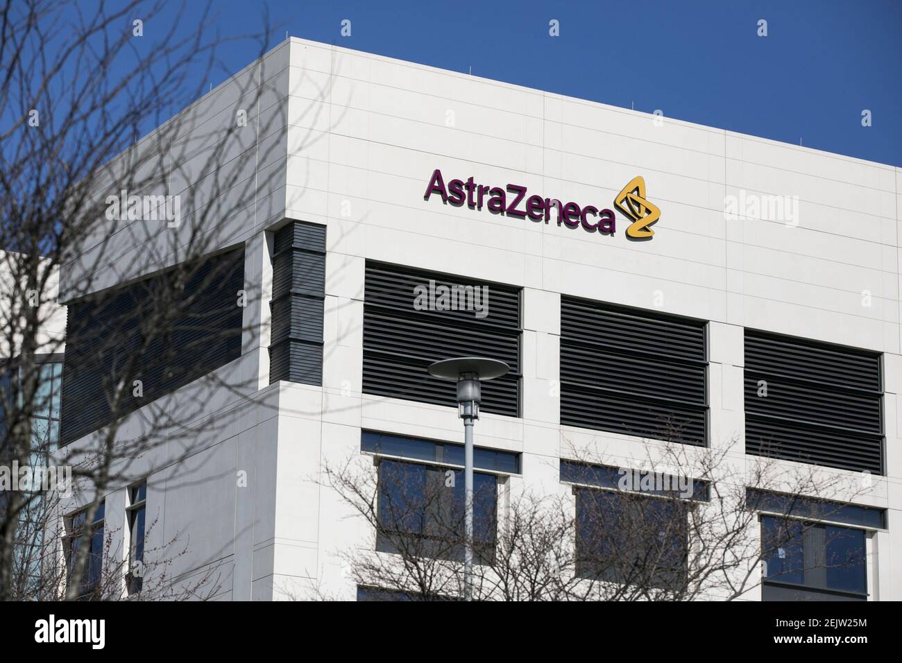 A logo sign outside of a facility occupied by AstraZeneca in Germantown ...