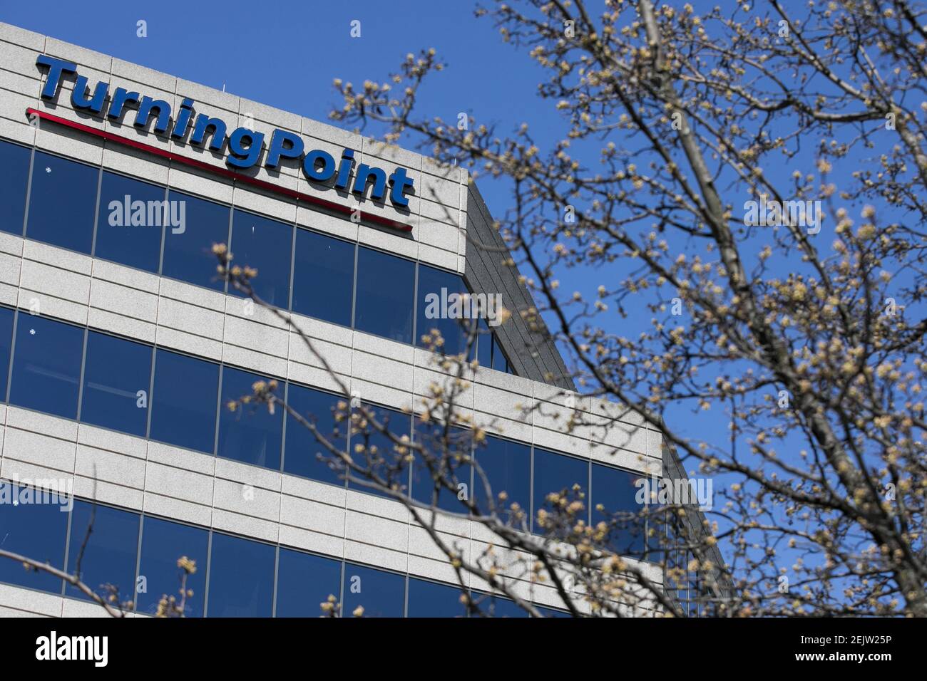 A logo sign outside of the headquarters of TurningPoint Global ...