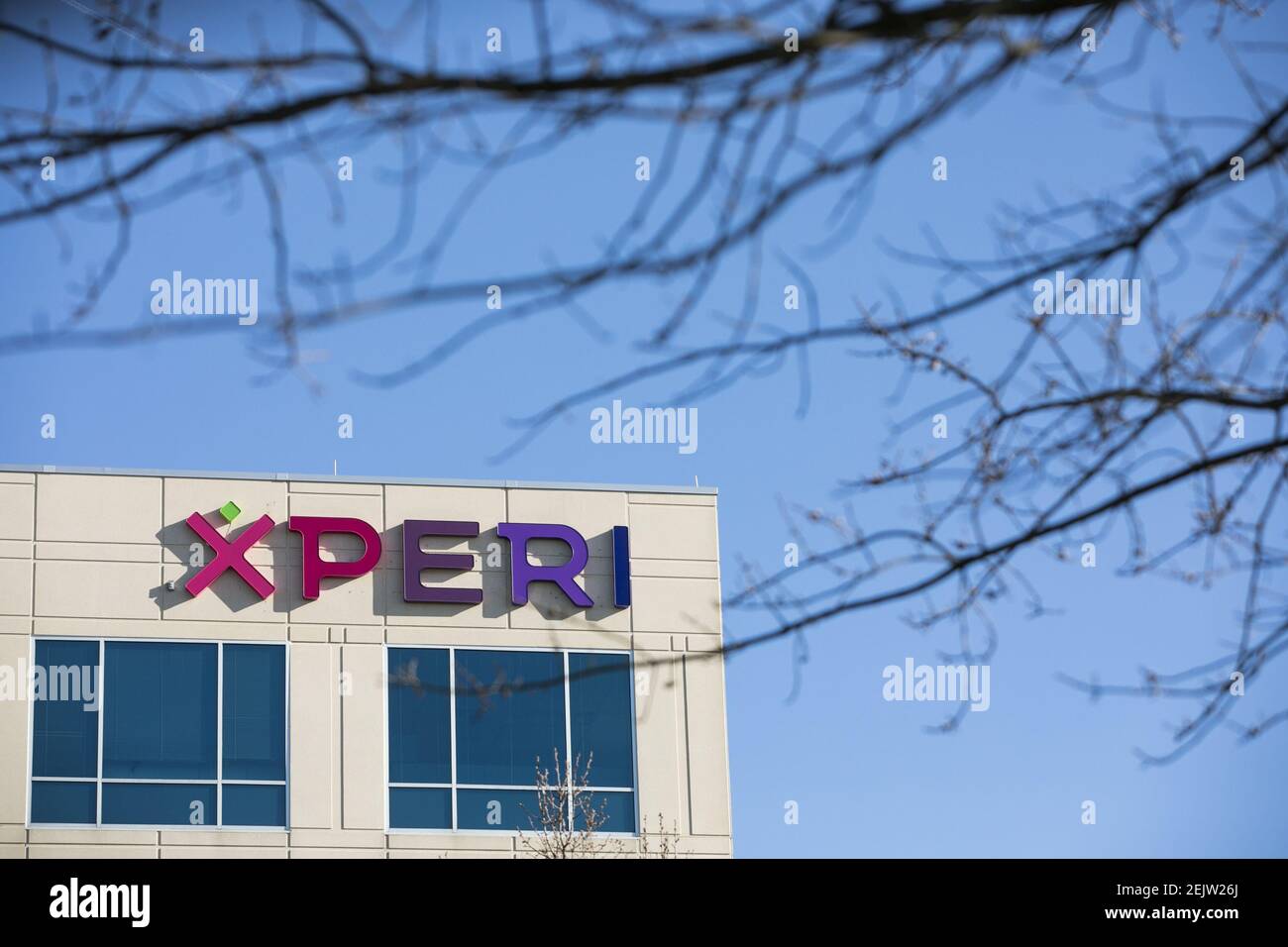 A logo sign outside of a facility occupied by Xperi Corporation in ...