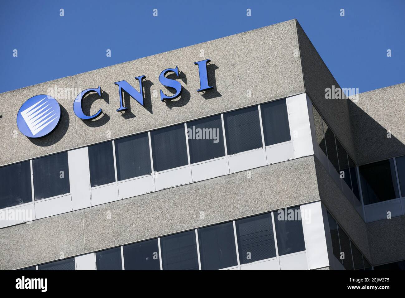 A logo sign outside of the headquarters of CNSI in Rockville, Maryland ...