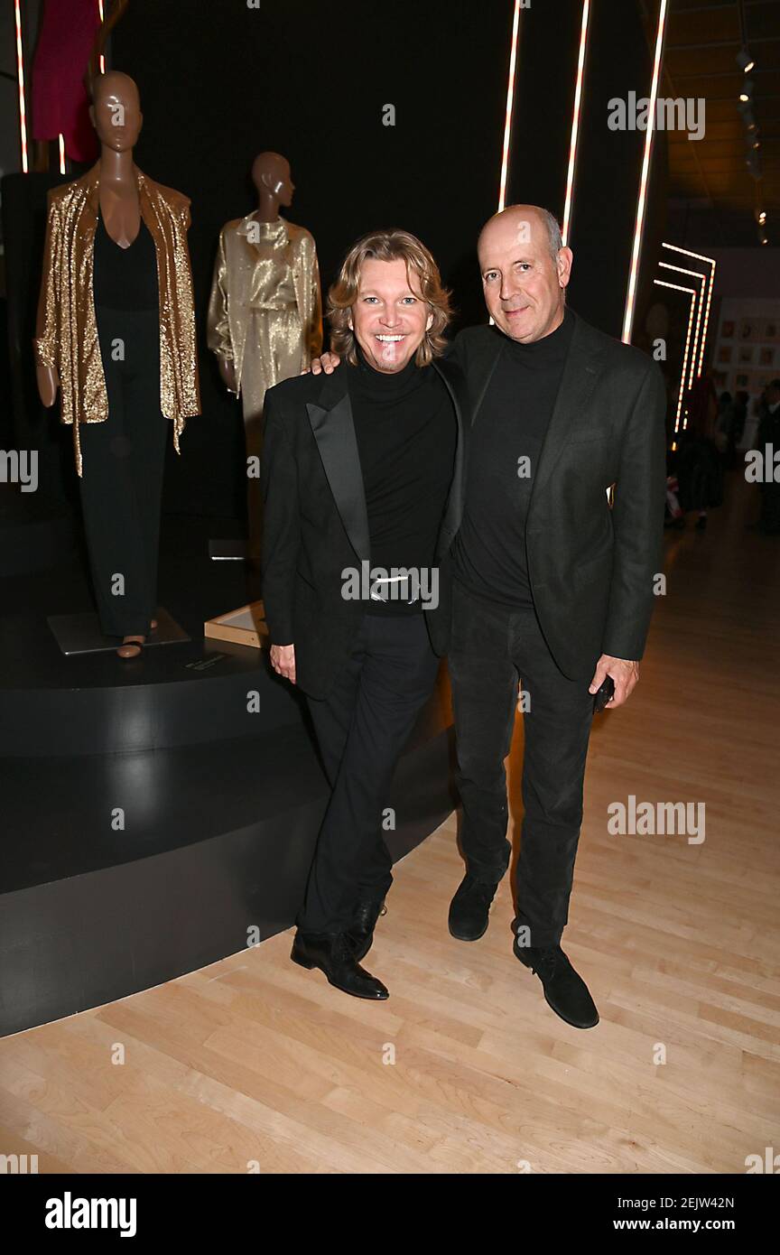 Mark Payne, owner of Liza jacket behind him by Halston, and Michael ...