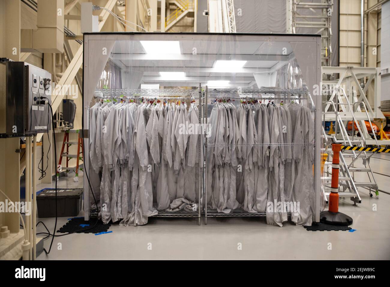 Containment suits are seen at Nasa where they unveiled the Orion Space ...