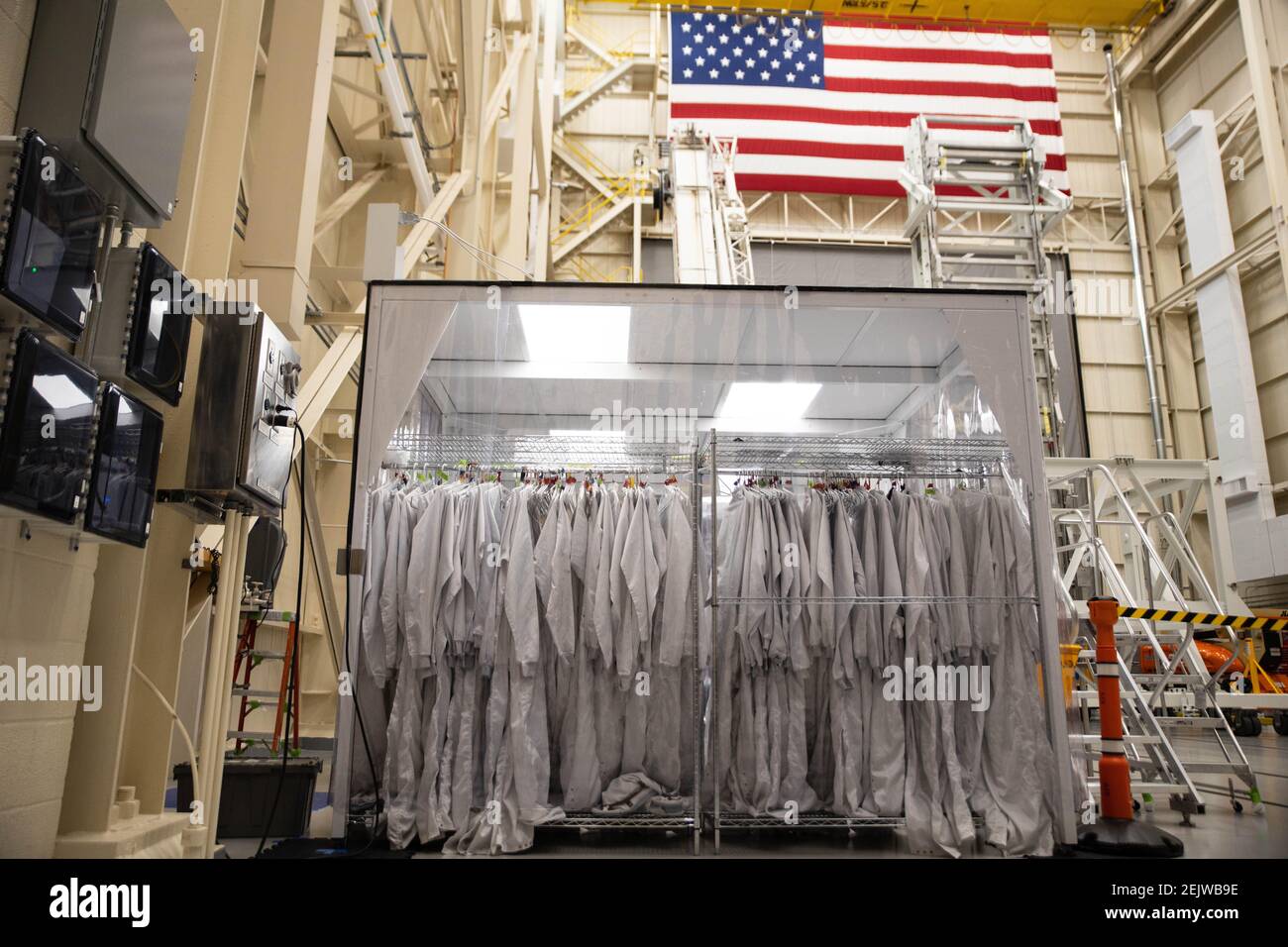 Containment suits are seen at Nasa where they unveiled the Orion Space ...