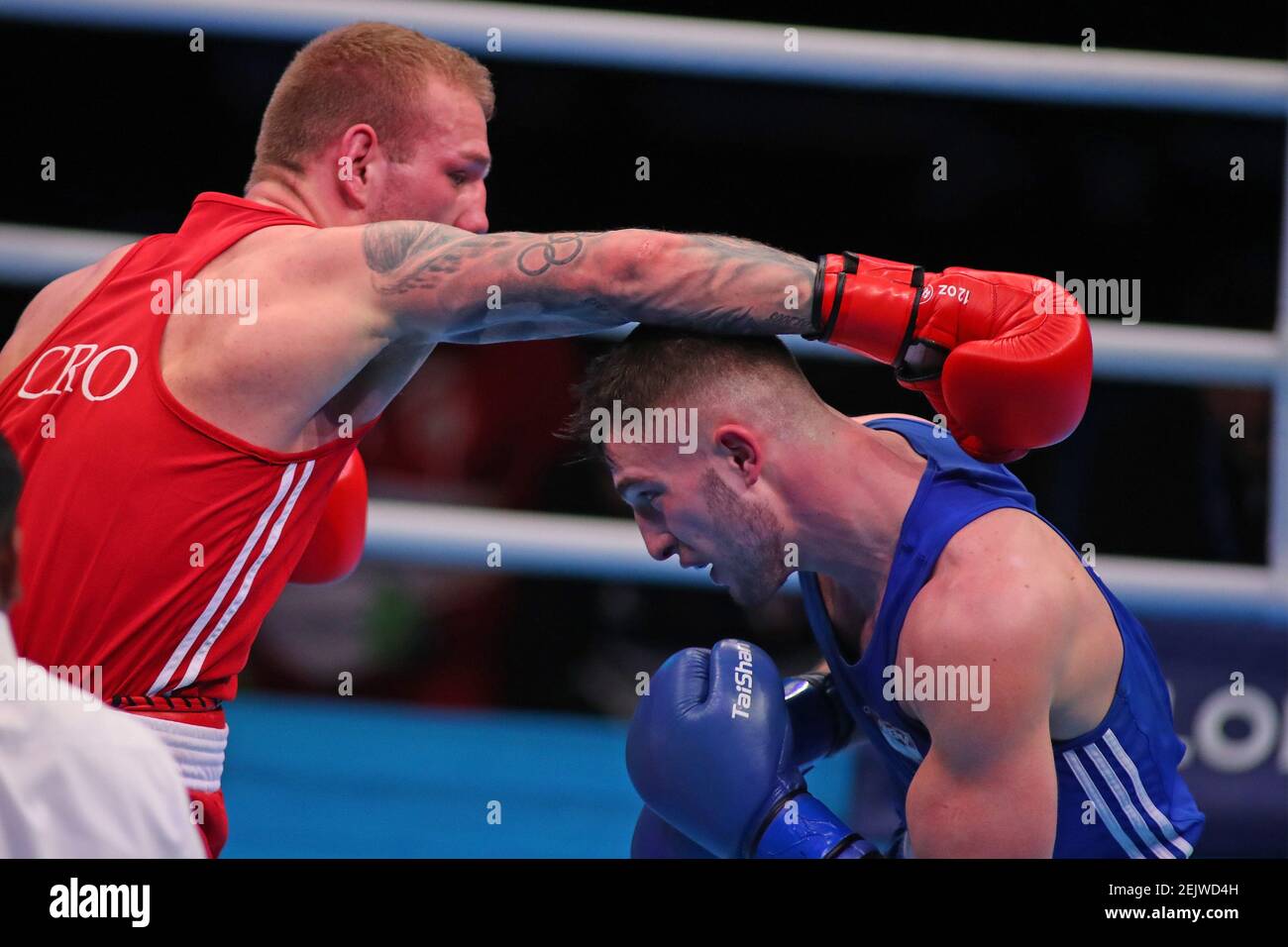 Luka Plantic of Croatia, wearing red and Umar Dzambekov of Austria ...