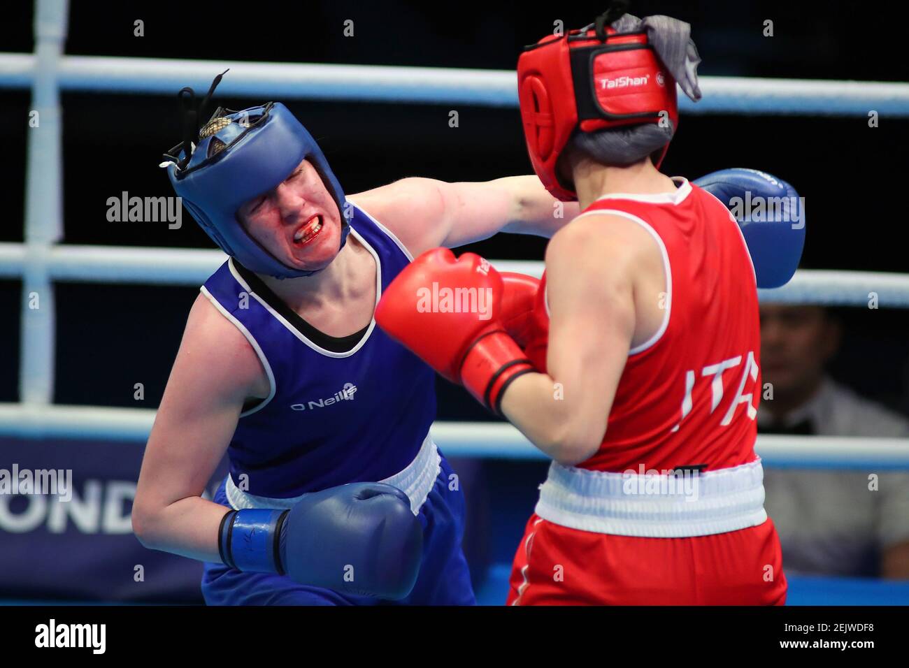 Angela Carini of Italy, wearing red and Christina Desmond of Ireland ...