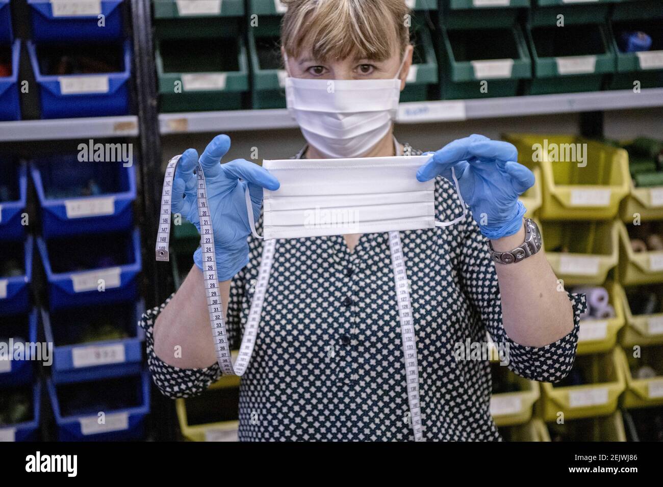 Graziella Baldino, head of the Miroglio atelier in Alba, test a mask at ...