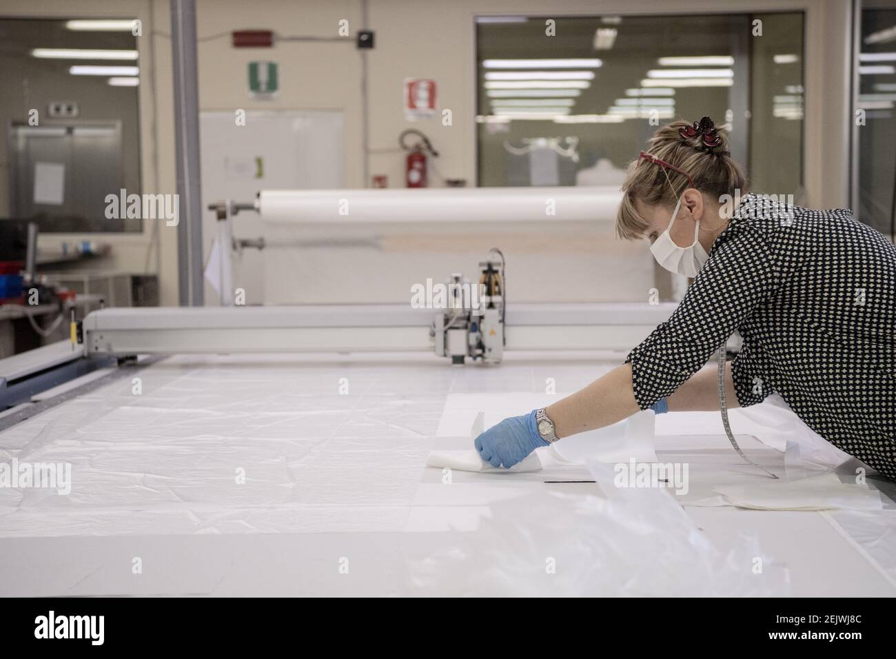 Women working in the Miroglio Atelier in Alba to produce the masks at ...