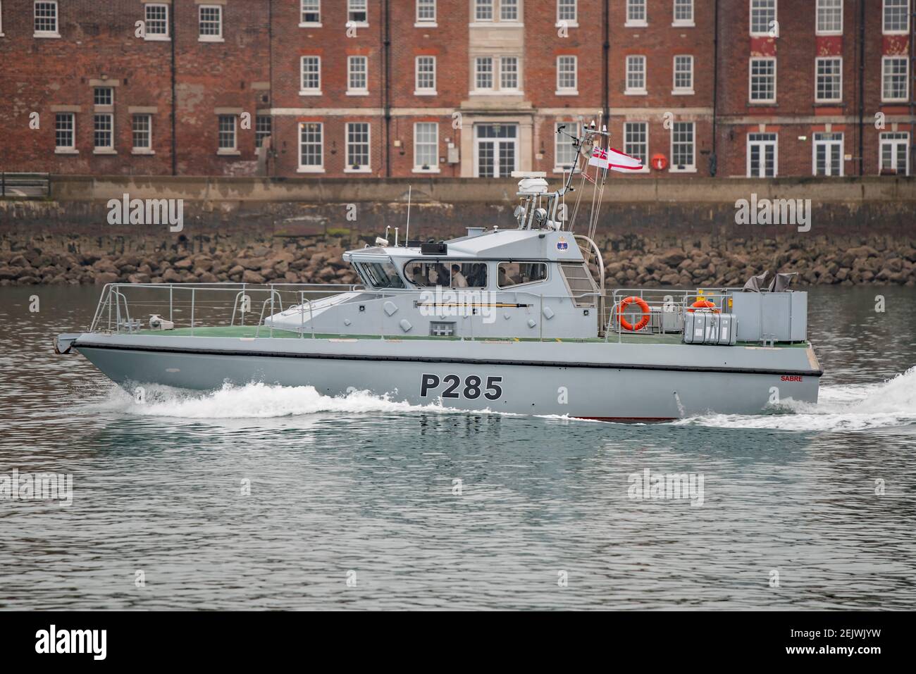 The Royal Navy coastal forces patrol boat HMS Sabre (P285) seen leaving ...