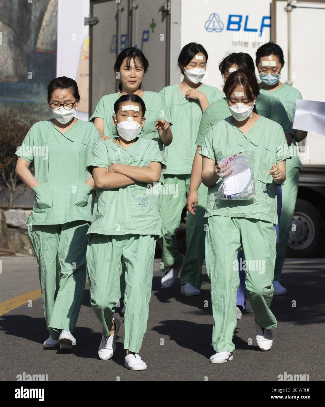 South Korean medical staff members arrive for a duty shift at Keimyung ...