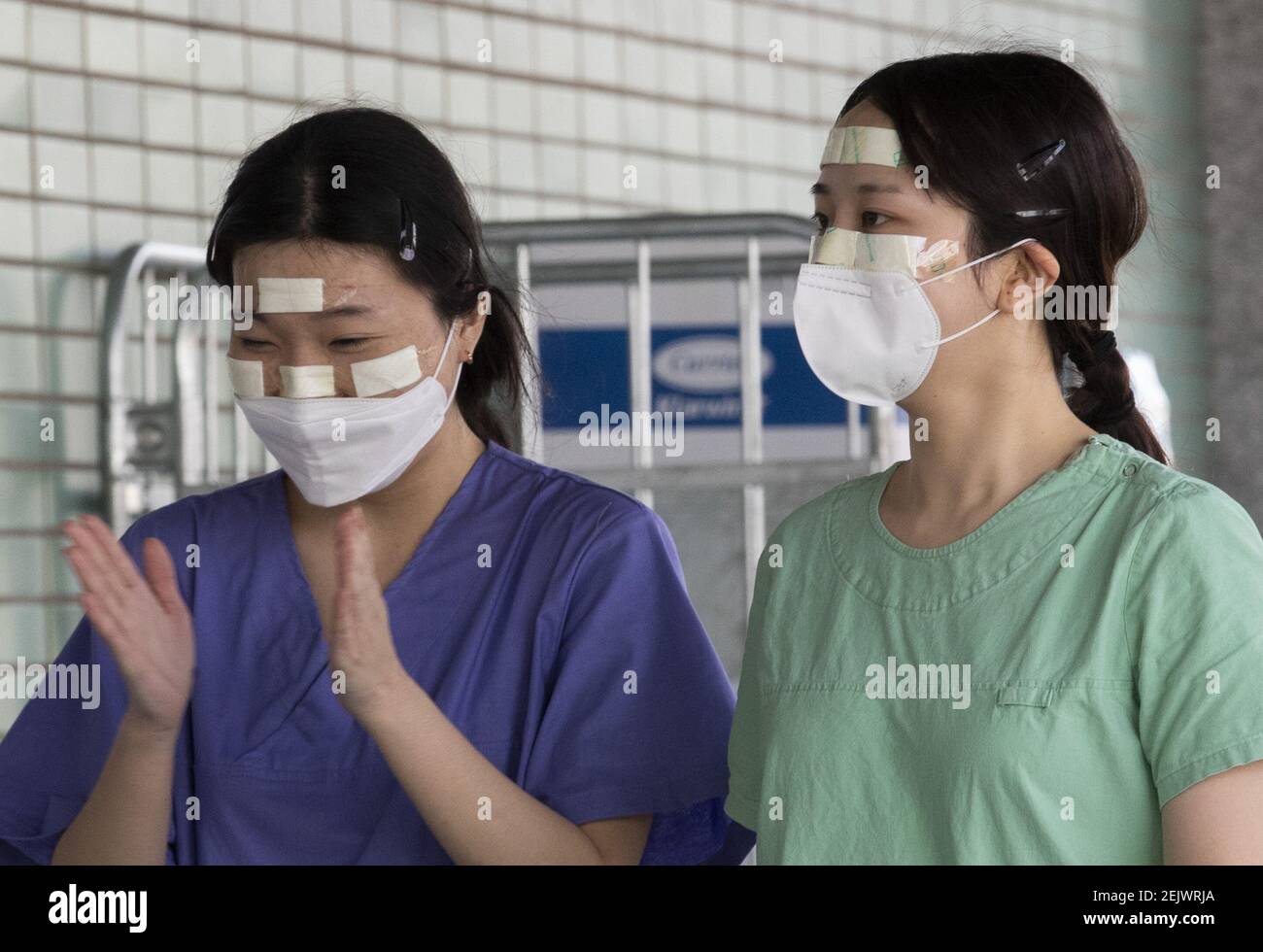 South Korean medical staff members arrive for a duty shift at Keimyung ...