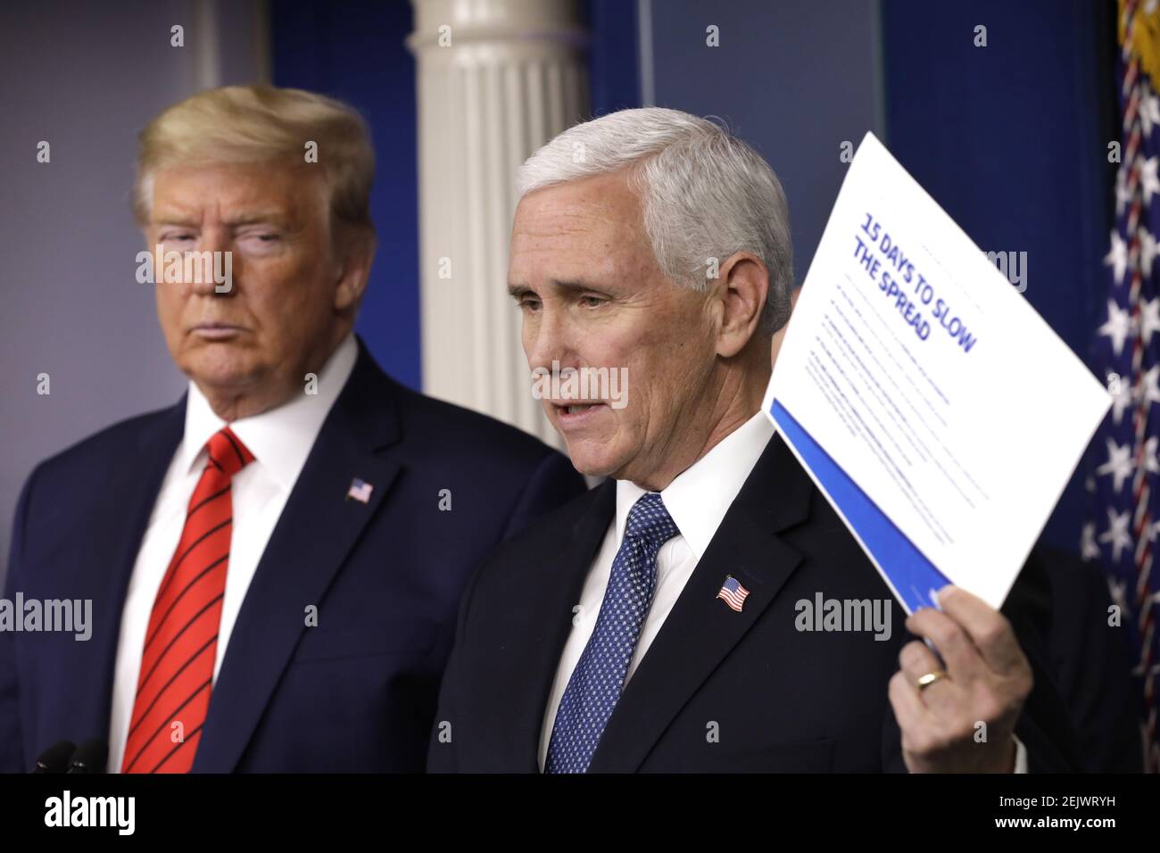 U.S. Vice President Mike Pence speaks next to President Donald Trump ...