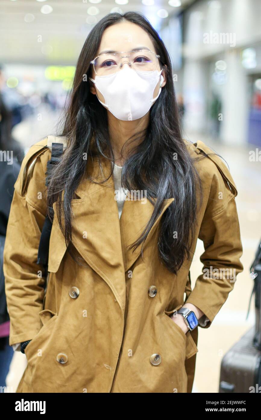 Chinese singer and actress Han Xue arrives at a Beijing airport after ...