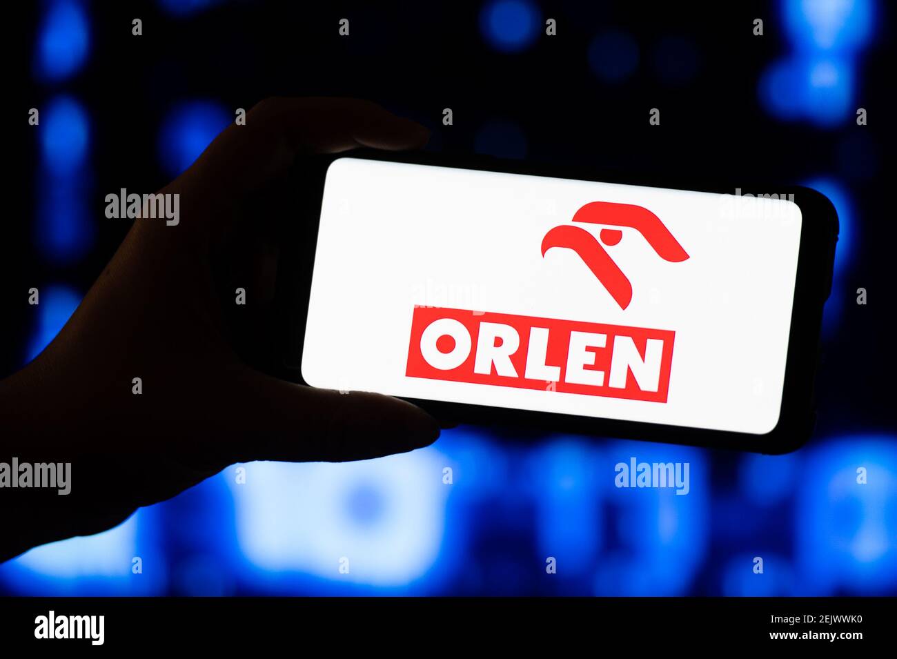 In this photo illustration an Orlen logo is seen displayed on a ...