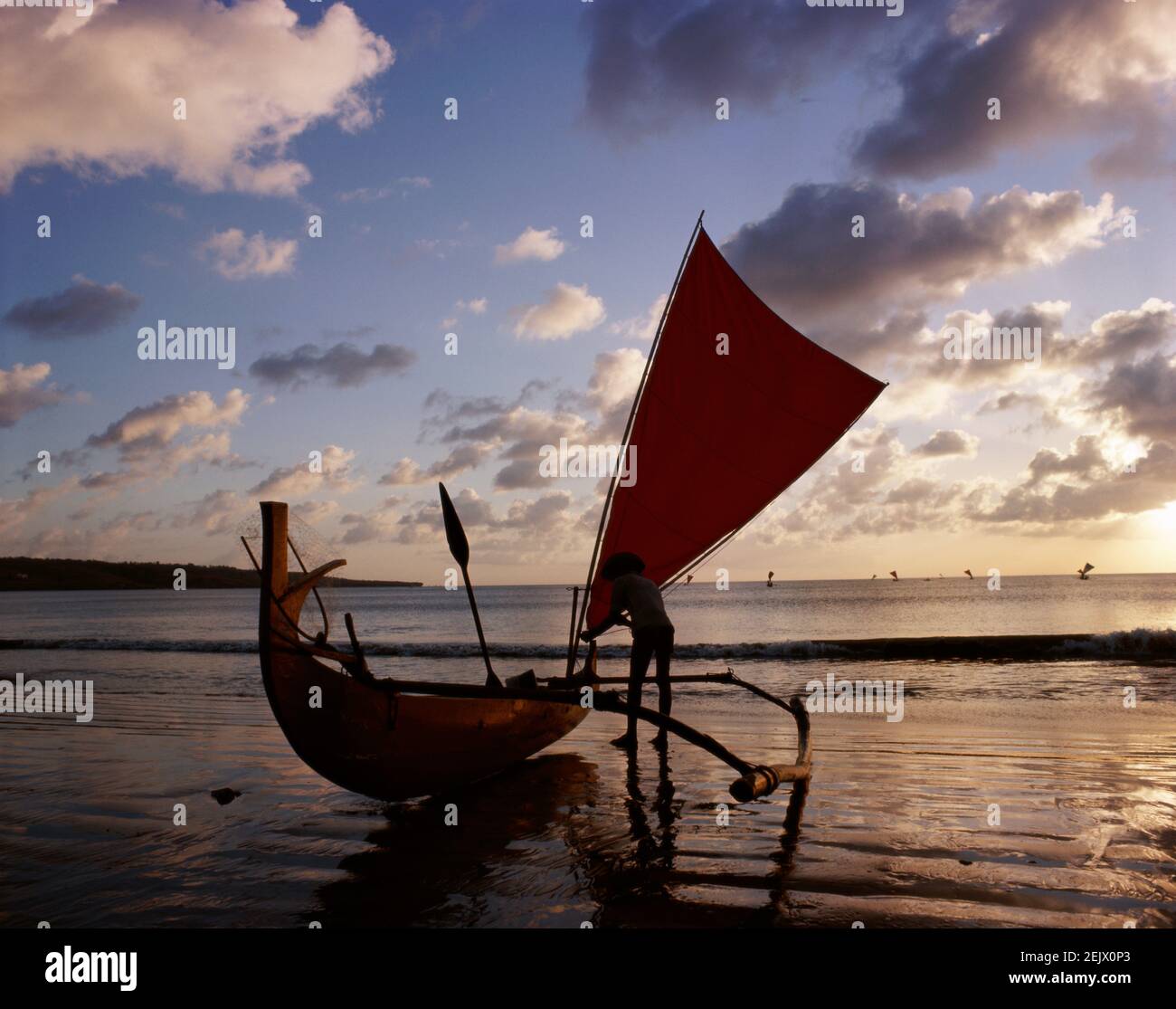 Asia, Indonesia, Bali island,Kuta beach,local fishermen with ...