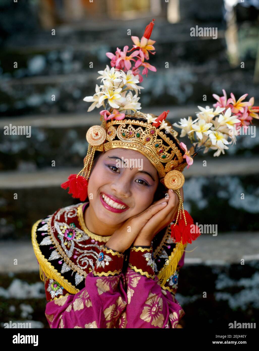 Asia, Indonesia, Bali, Portrait of a beautiful smiling young Balinese ...