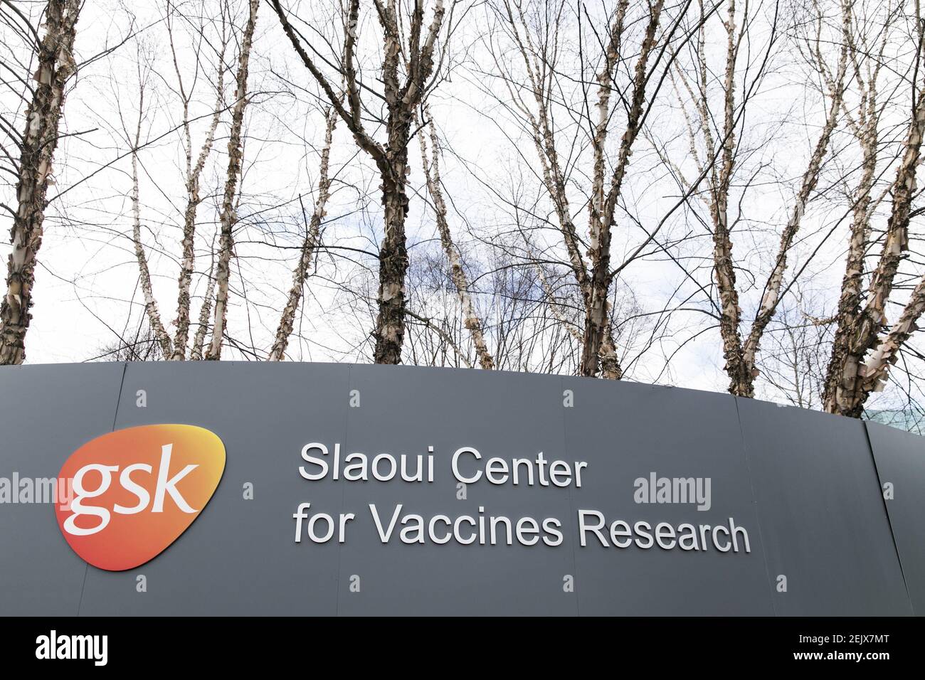 A logo sign outside of the GlaxoSmithKline (GSK) Slaoui Center for ...
