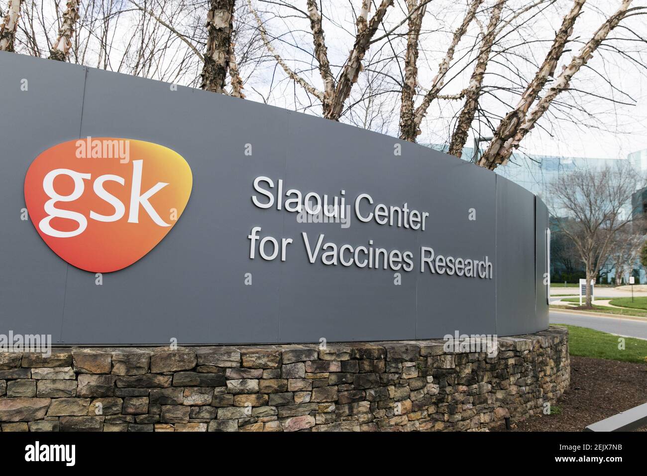 A logo sign outside of the GlaxoSmithKline (GSK) Slaoui Center for ...