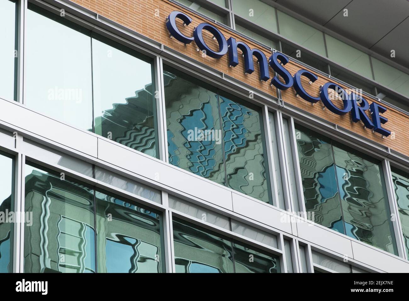 A logo sign outside of the headquarters of Comscore in Reston, Virginia ...