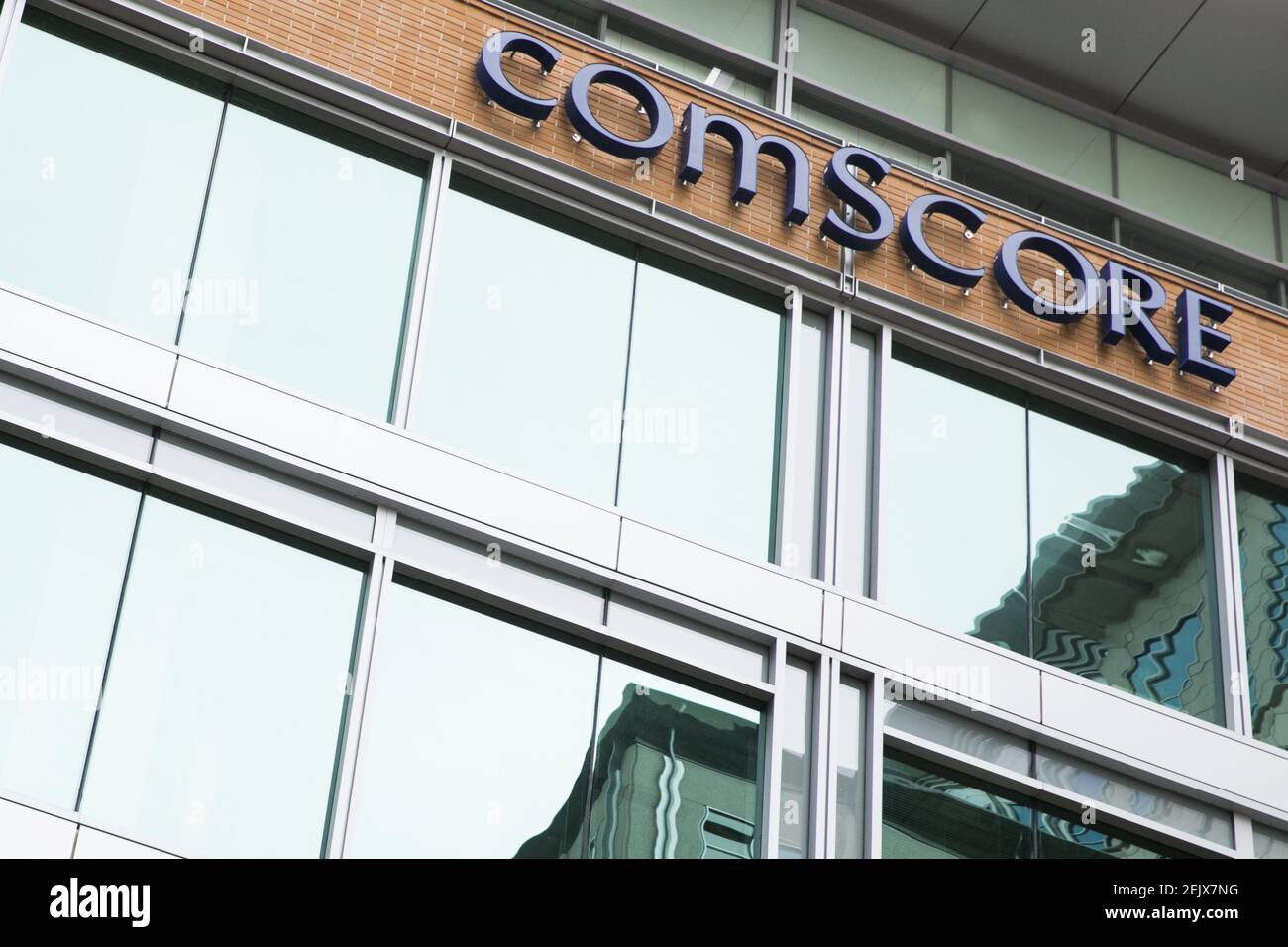 A logo sign outside of the headquarters of Comscore in Reston, Virginia ...
