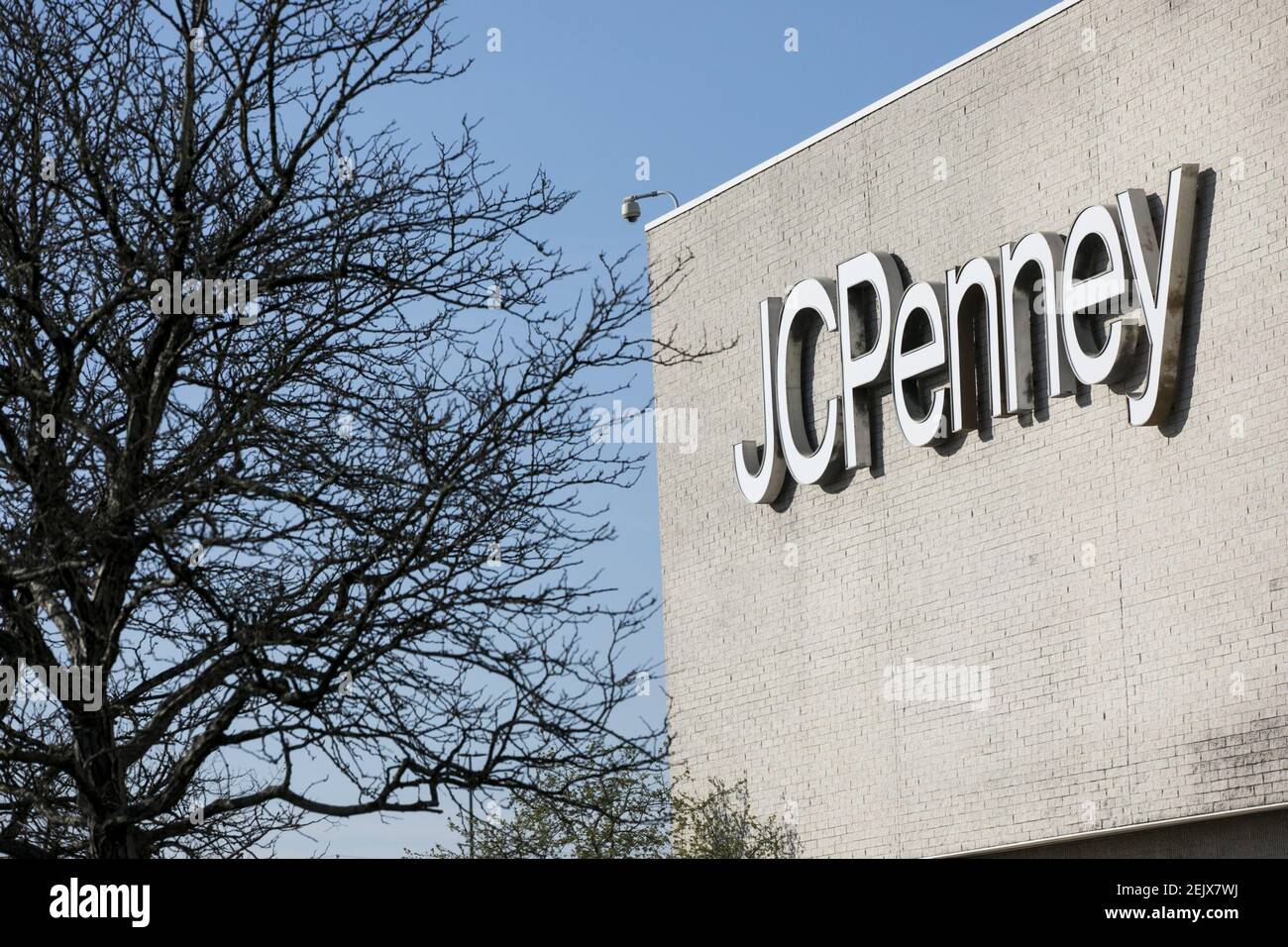 A logo sign outside of a JCPenney retail store location in North Wales ...