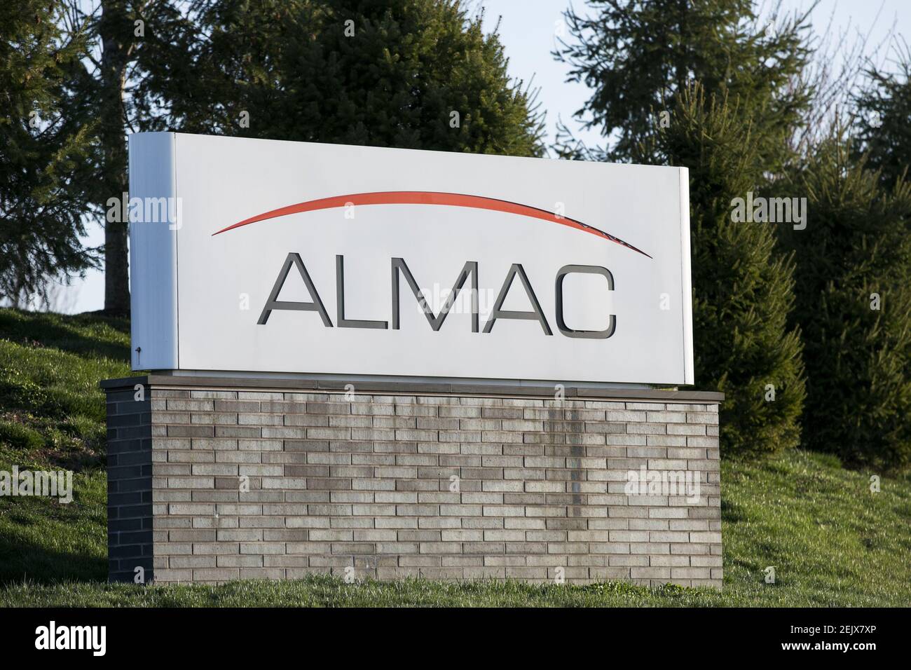 A logo sign outside of a facility occupied by Almac in Souderton ...