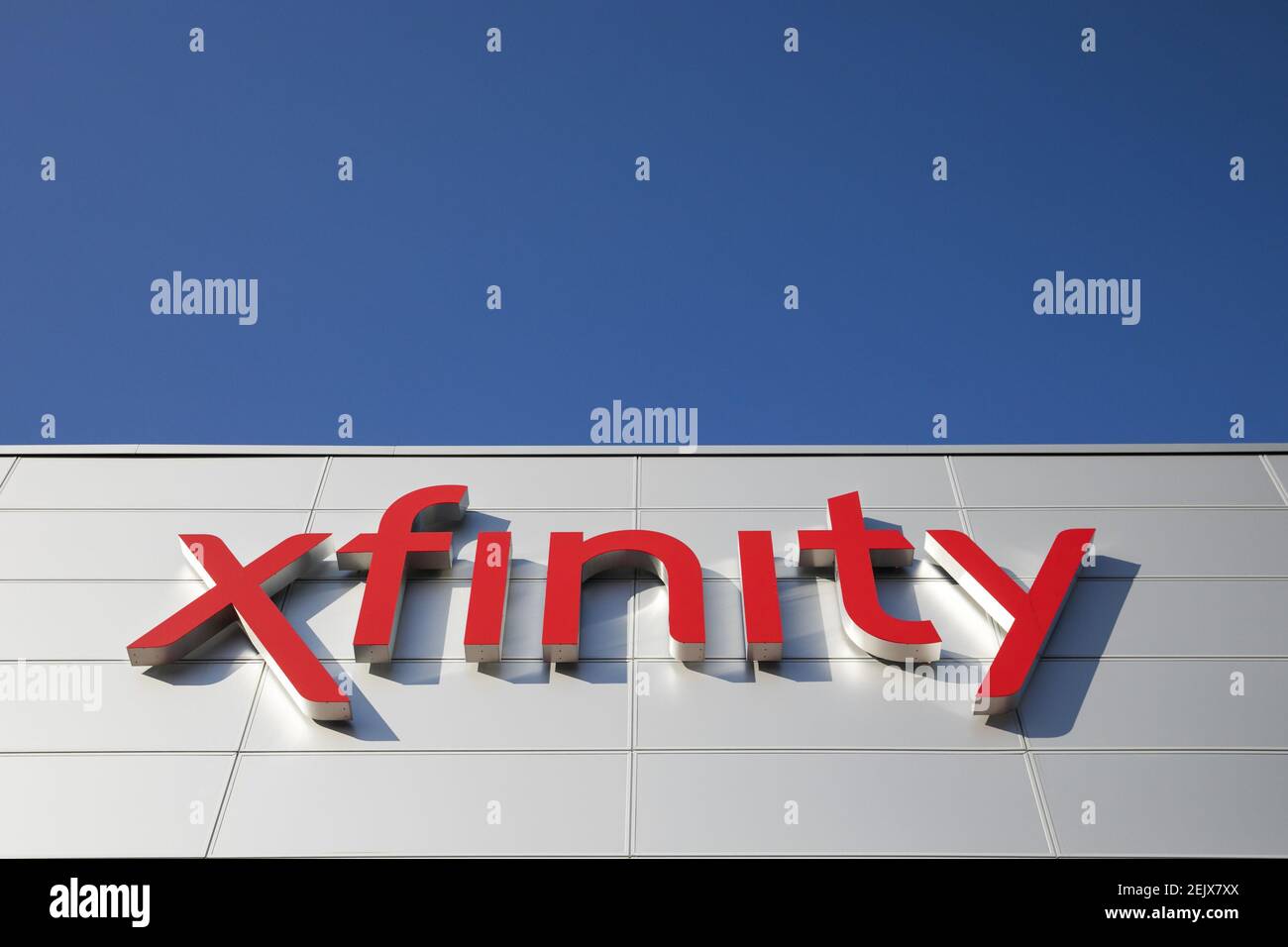 A logo sign outside of a xfinity retail store location in North Wales ...