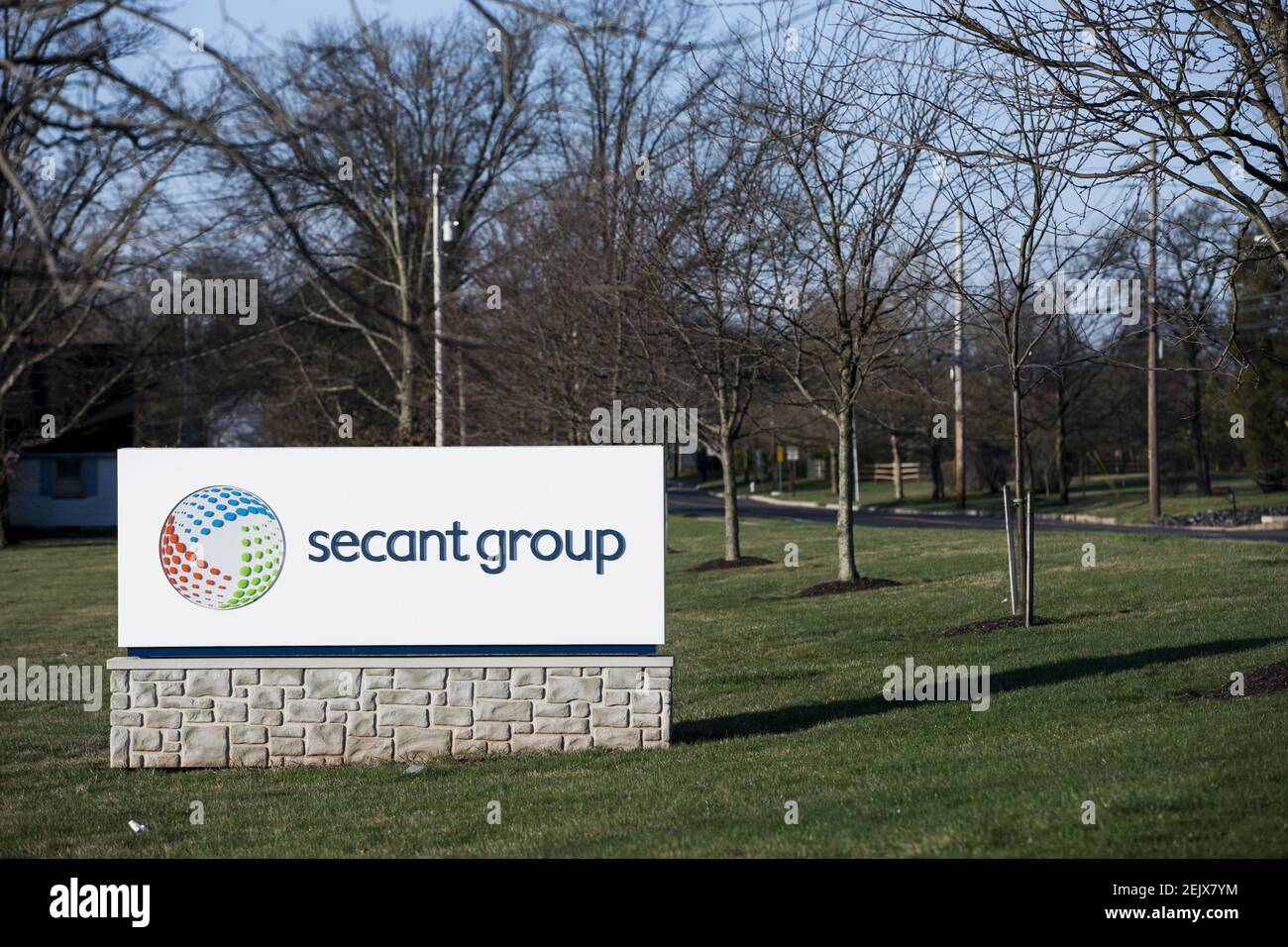 A logo sign outside of a facility occupied by the Secant Group in ...
