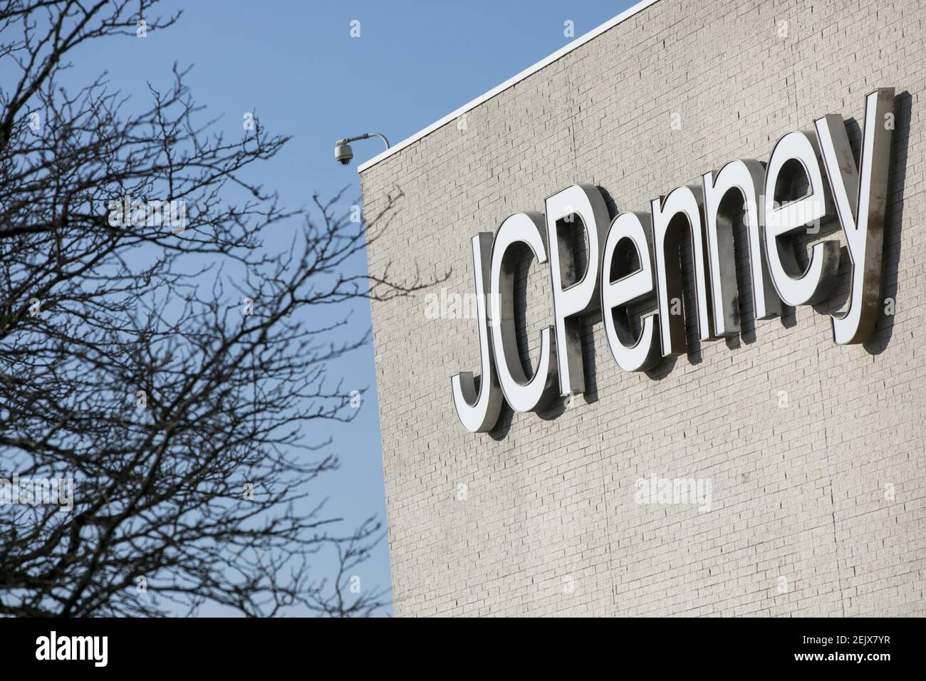 A logo sign outside of a JCPenney retail store location in North Wales ...