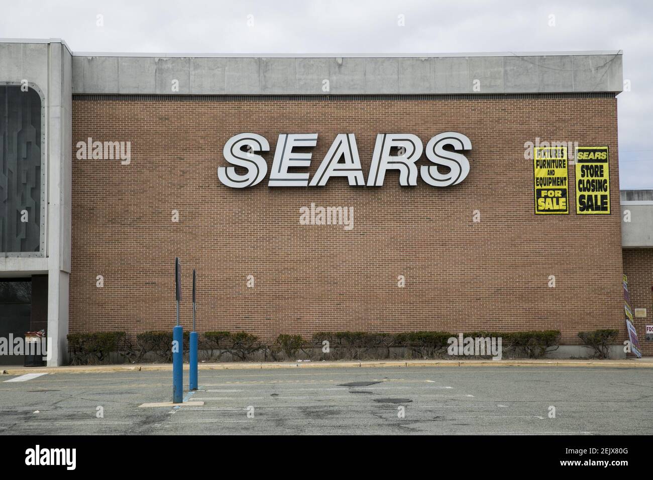 'Store Closing' signs outside of a Sears retail store location in ...