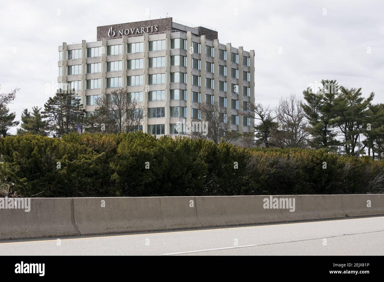 A logo sign outside of a facility occupied by Novartis in East Hanover ...