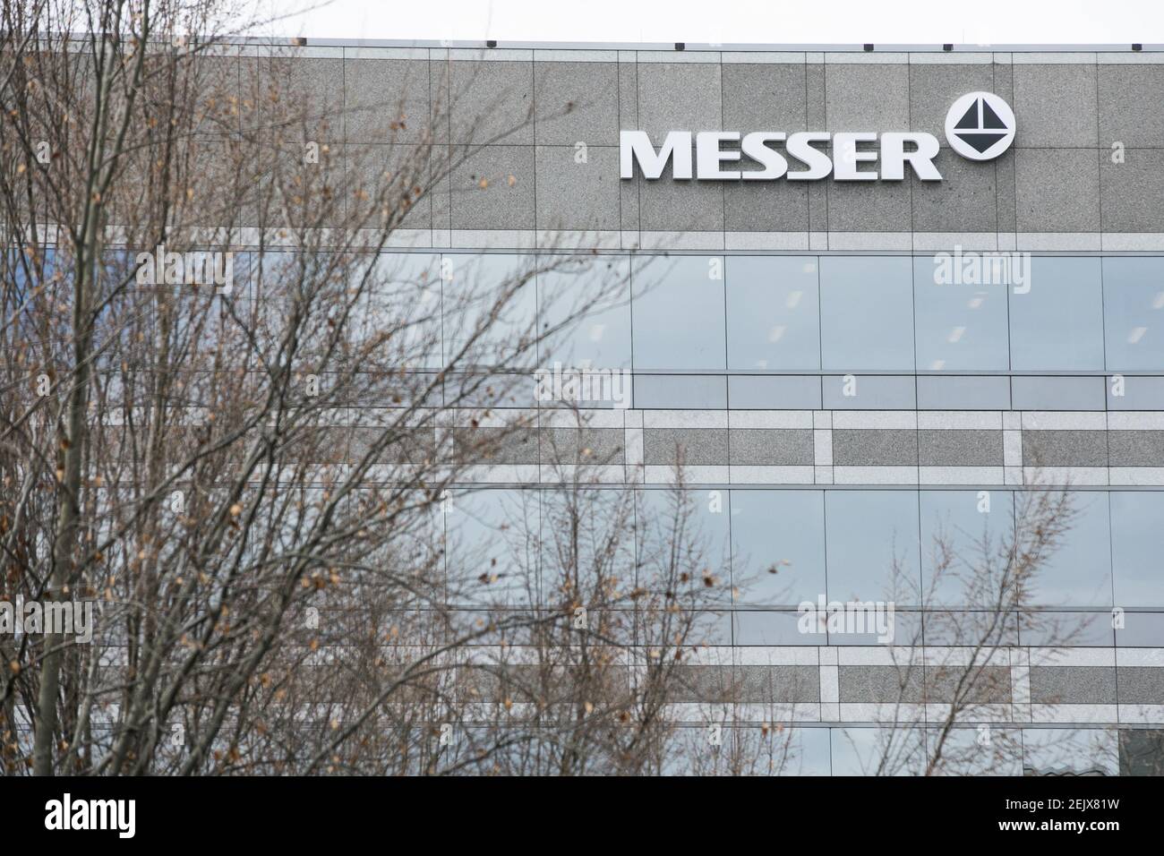 A logo sign outside of a facility occupied by The Messer Group in ...