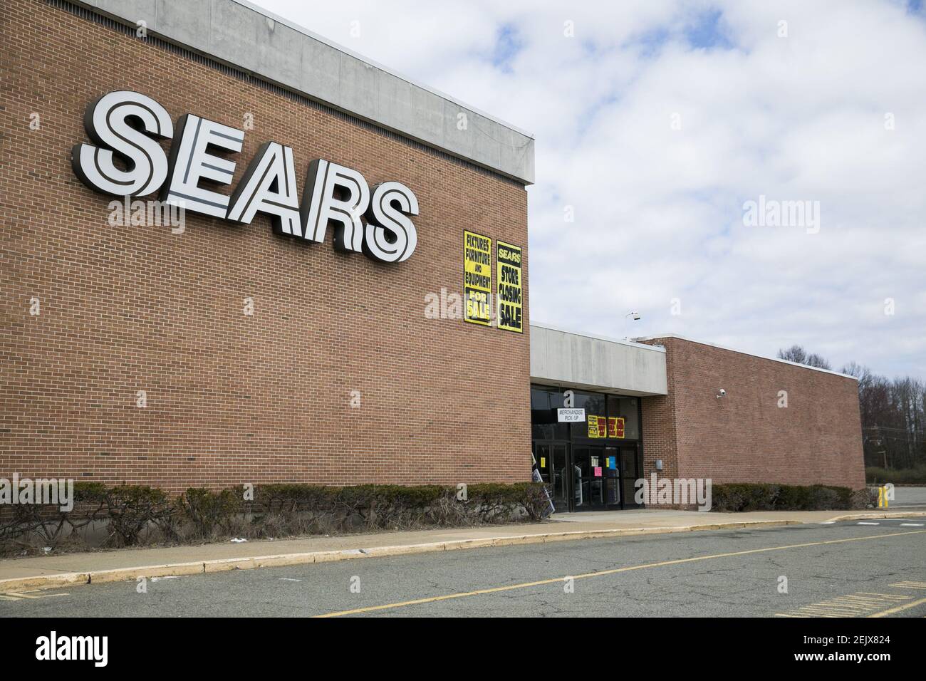 'Store Closing' signs outside of a Sears retail store location in ...