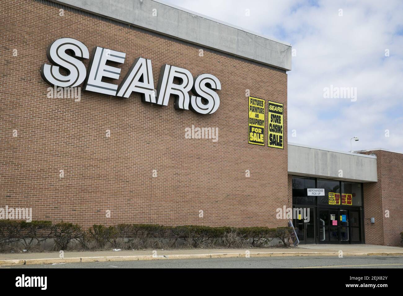 'Store Closing' signs outside of a Sears retail store location in ...