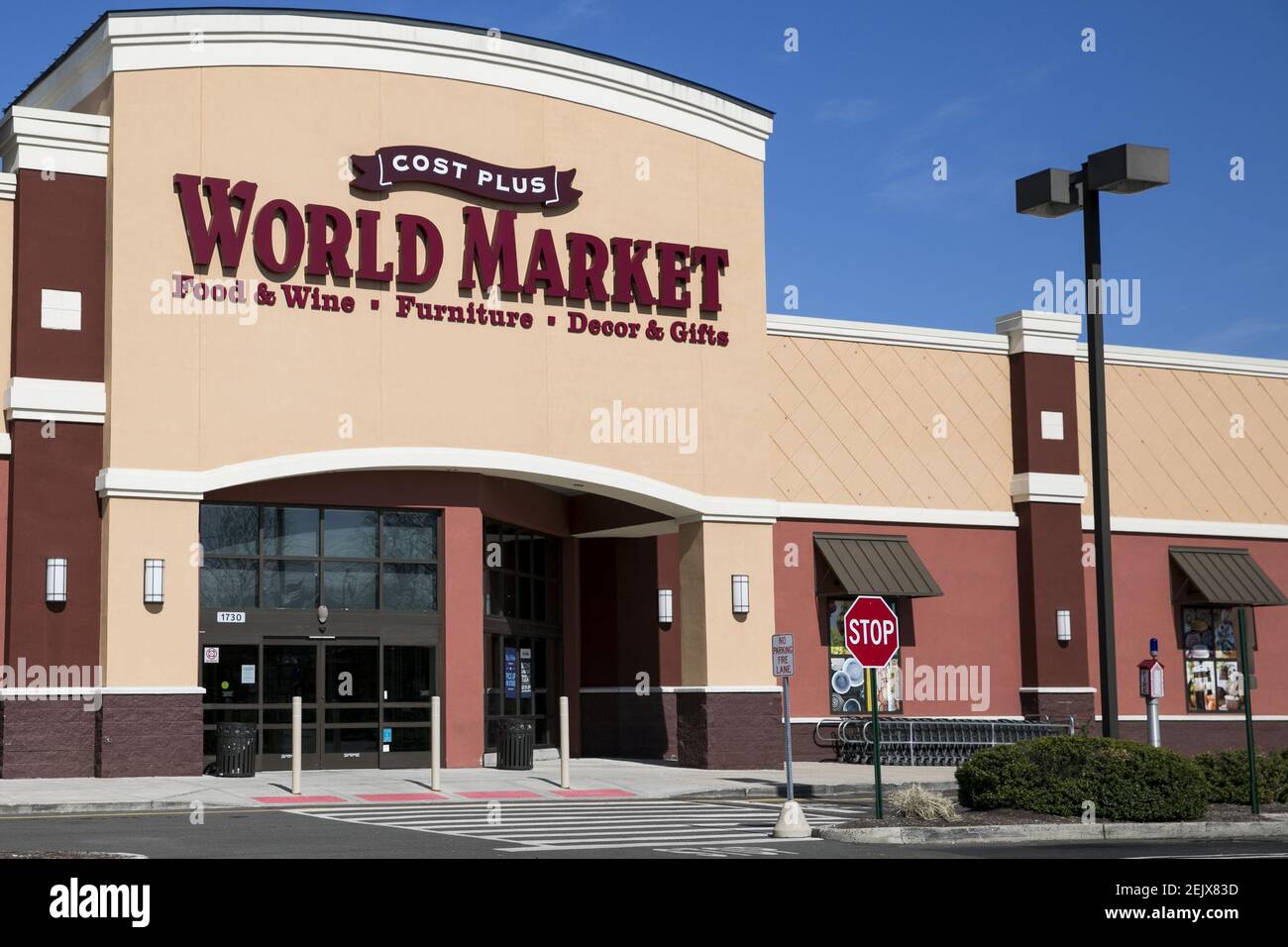 A logo sign outside of a Cost Plus World Market retail store location ...
