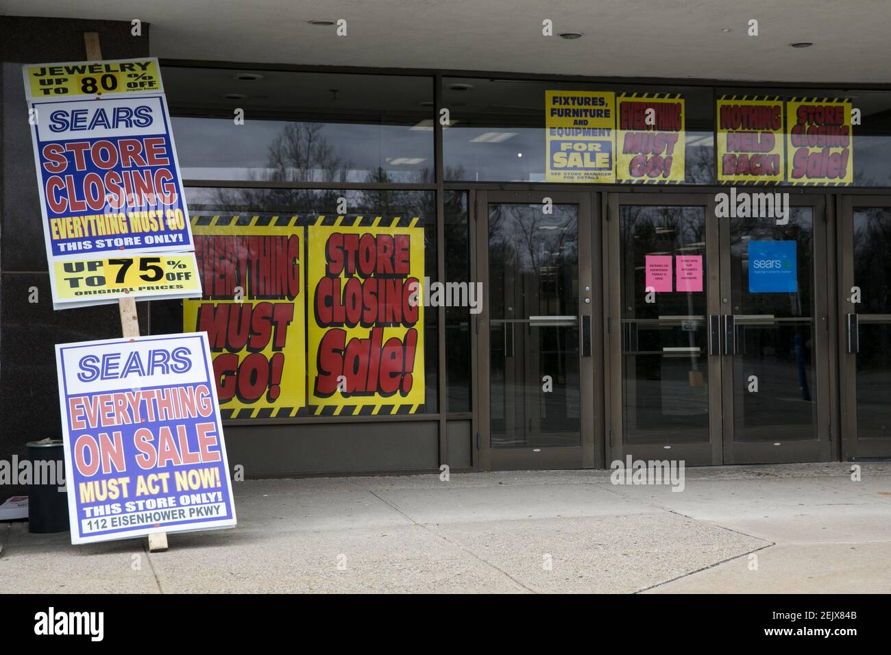'Store Closing' signs outside of a Sears retail store location in ...