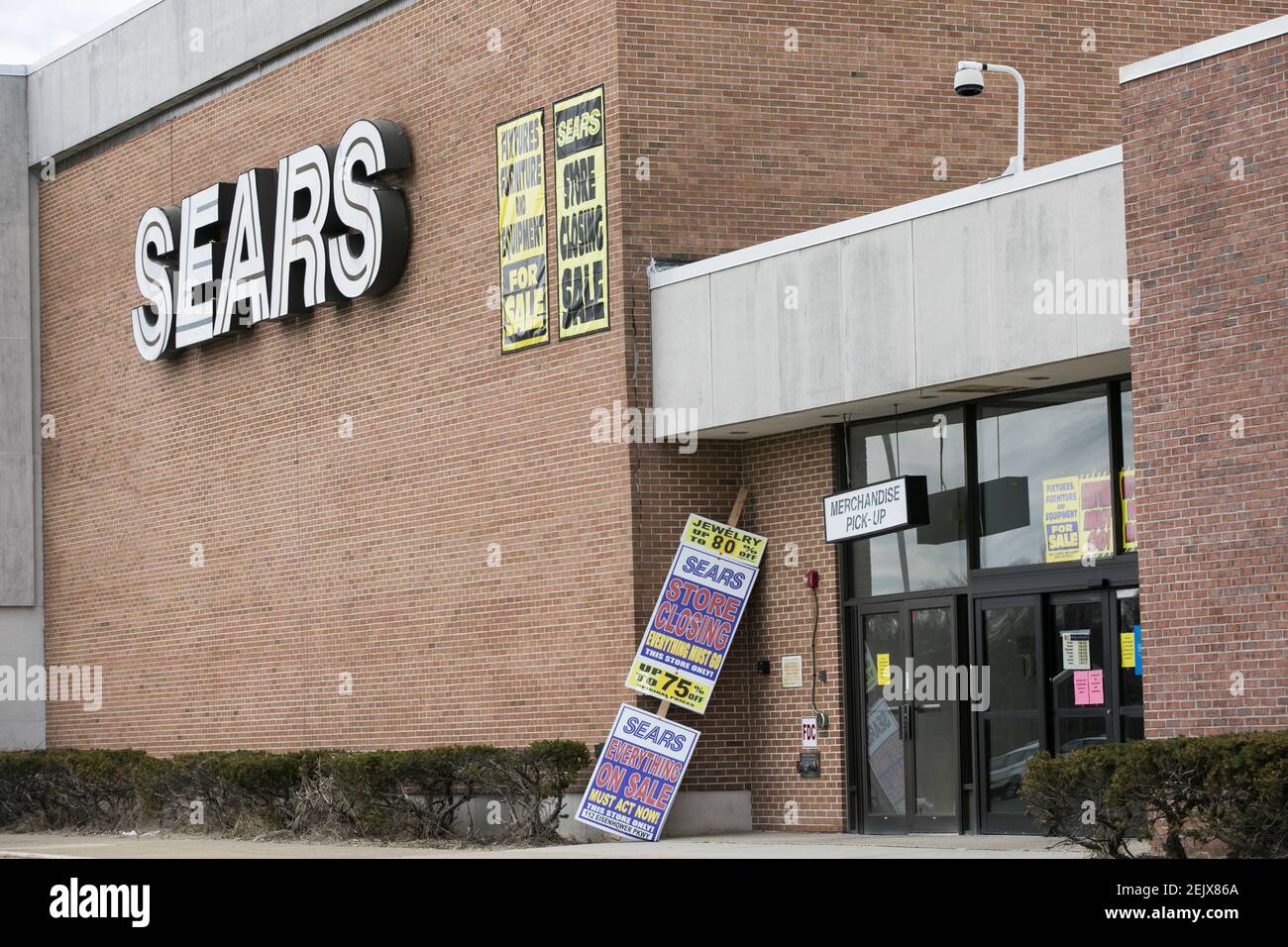'Store Closing' signs outside of a Sears retail store location in ...